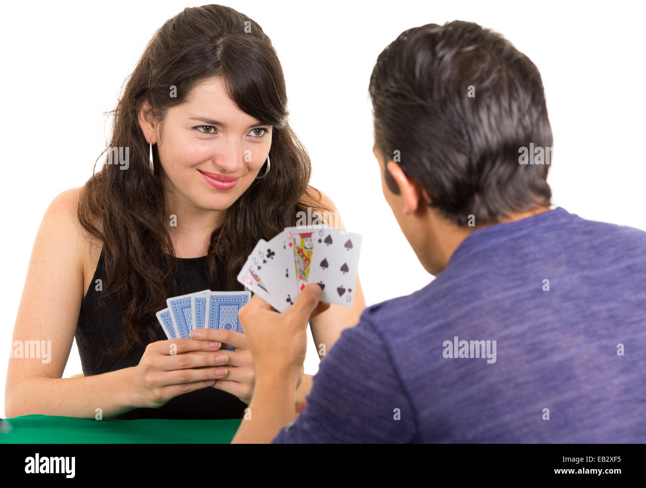 young couple playing cards cuarenta Stock Photo - Alamy