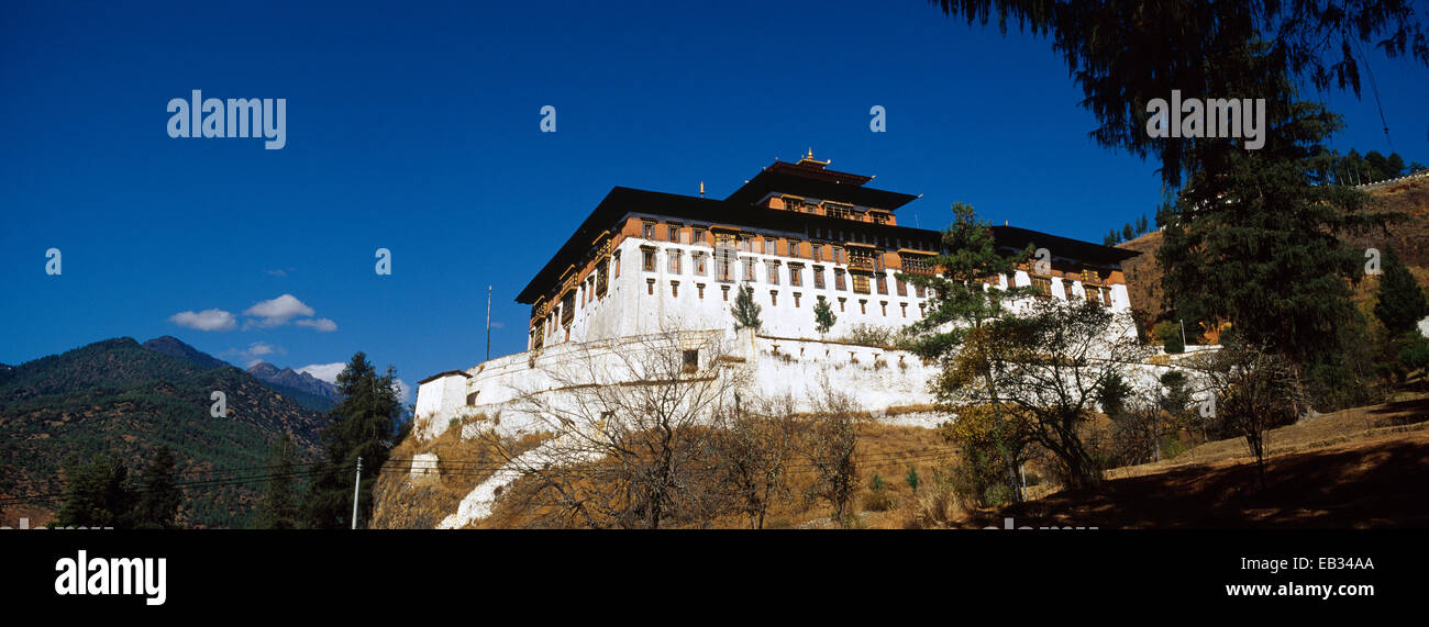 An ancient Buddhist monastery perched on a hillside overlooking a ...