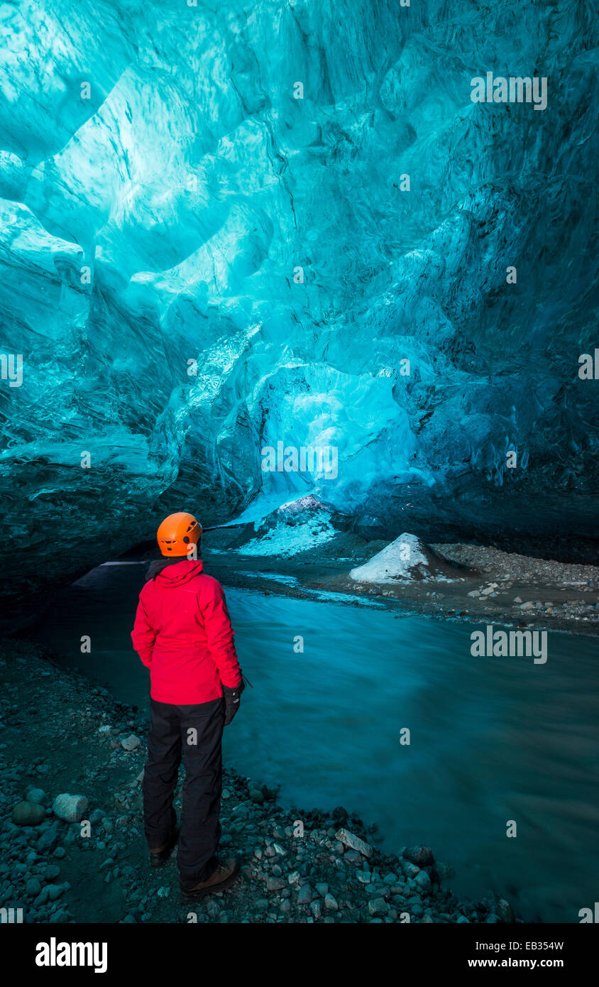 Young woman in ice cave below the Vatnajökull Glacier, Iceland Stock ...
