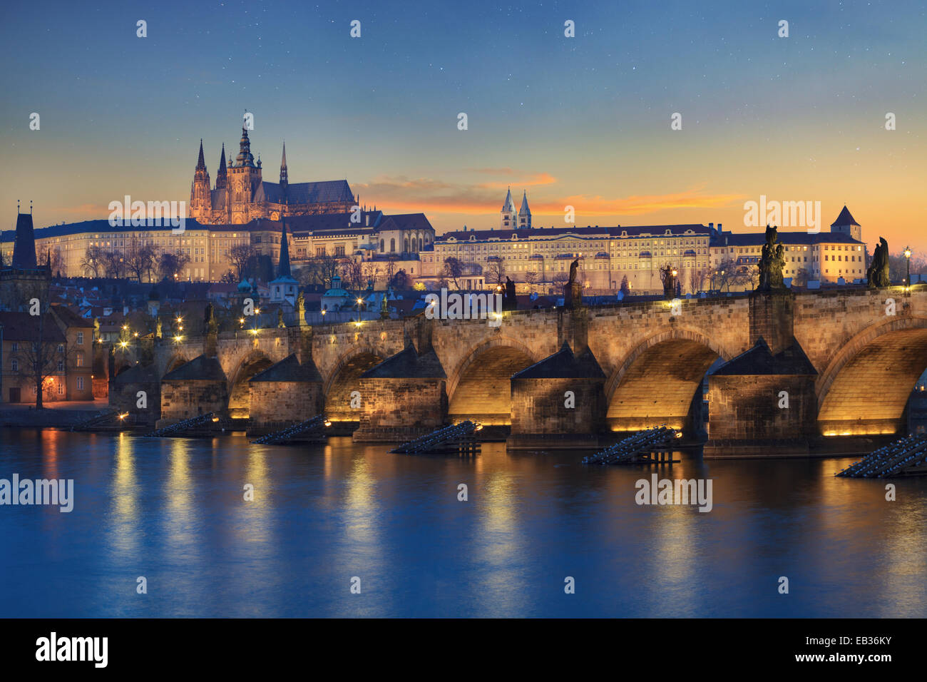 Charles Bridge Prague scenery over river at dusk Stock Photo - Alamy