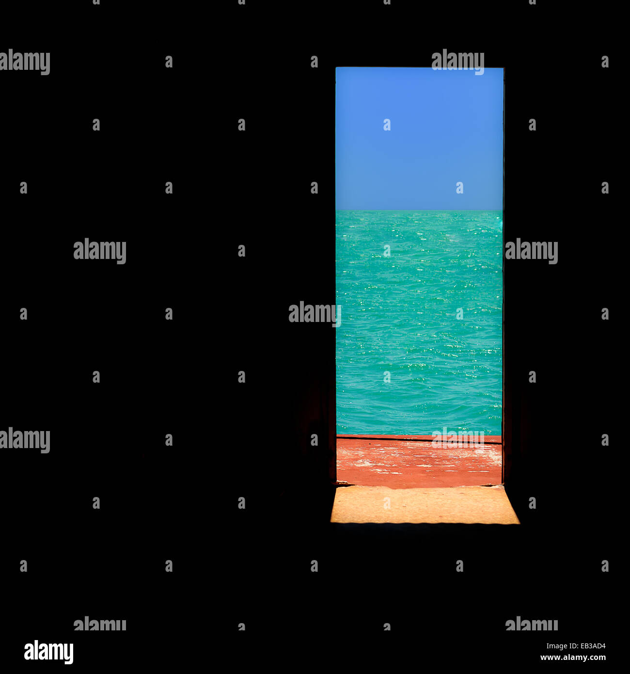 Looking at the ocean through an open window hi-res stock photography ...