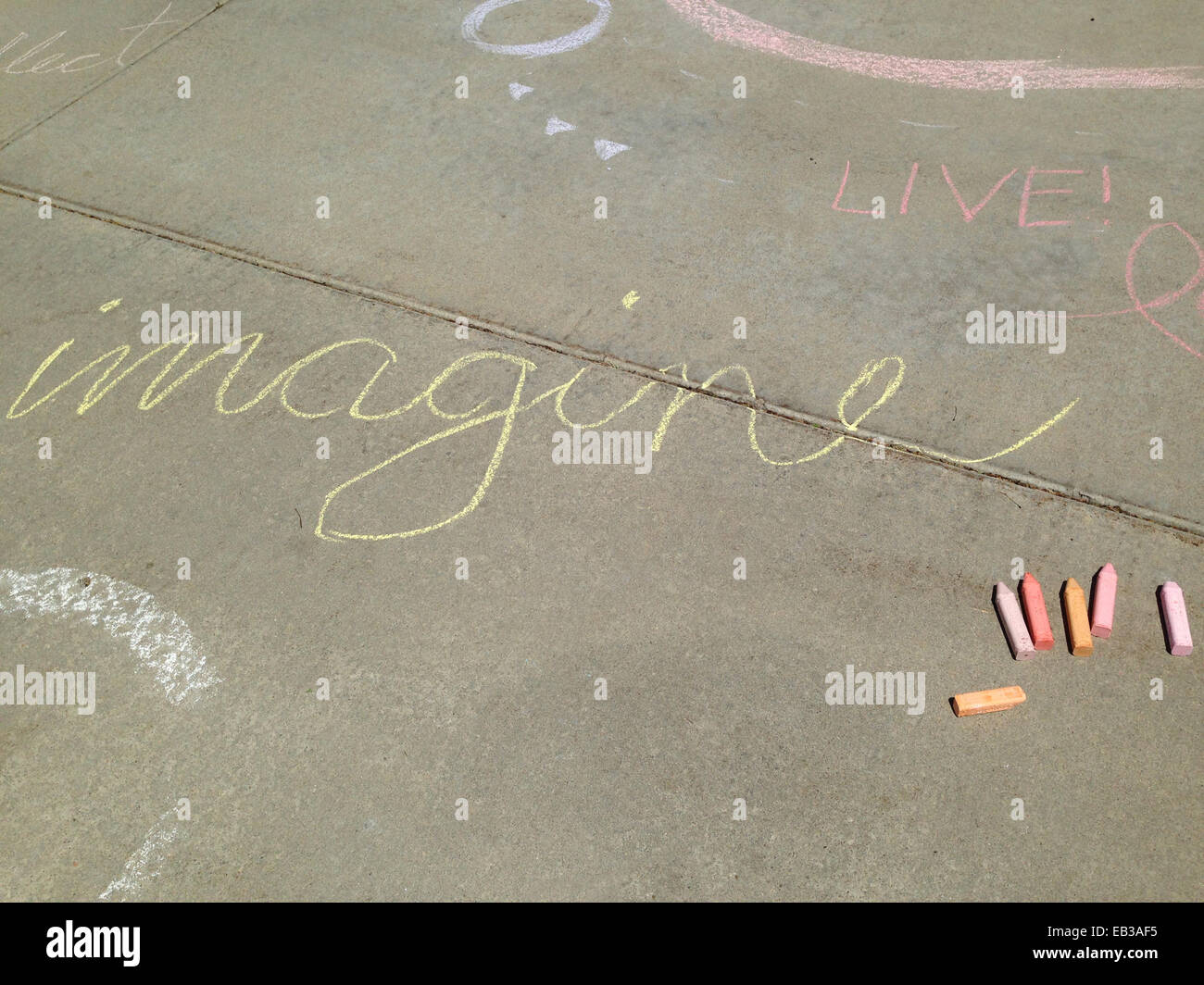 Colorful chalk drawings on sidewalk Stock Photo - Alamy