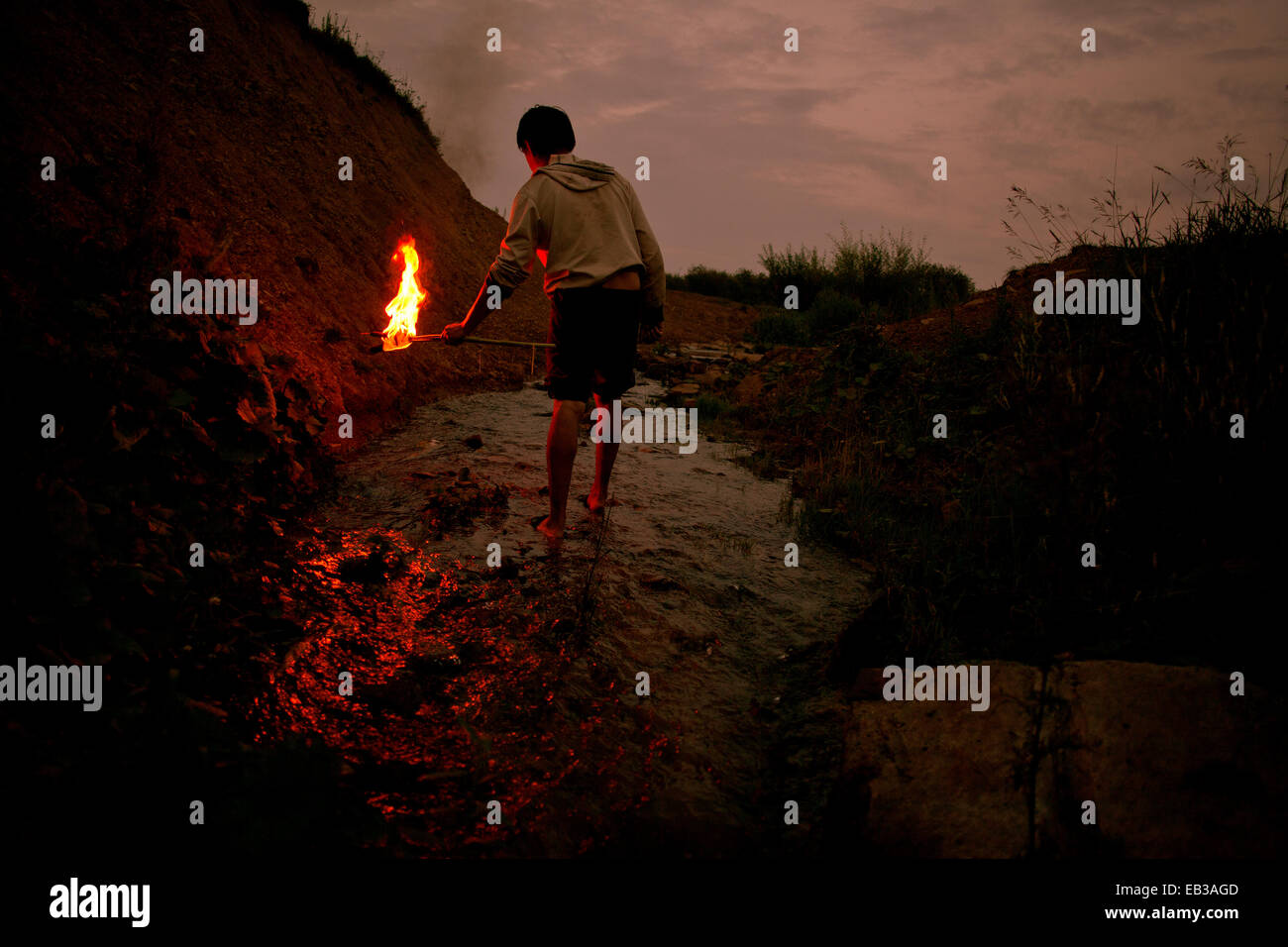 Man carrying torch hi-res stock photography and images - Alamy