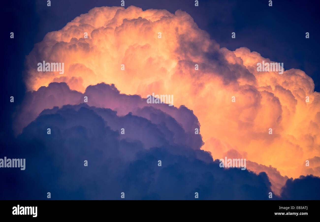 Storm clouds forming in the sky at sunset Stock Photo - Alamy