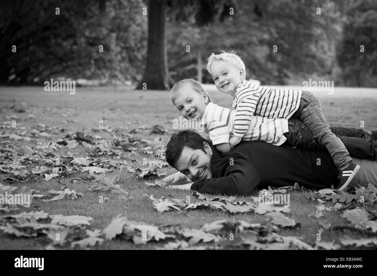 Father with boys Black and White Stock Photos & Images - Alamy