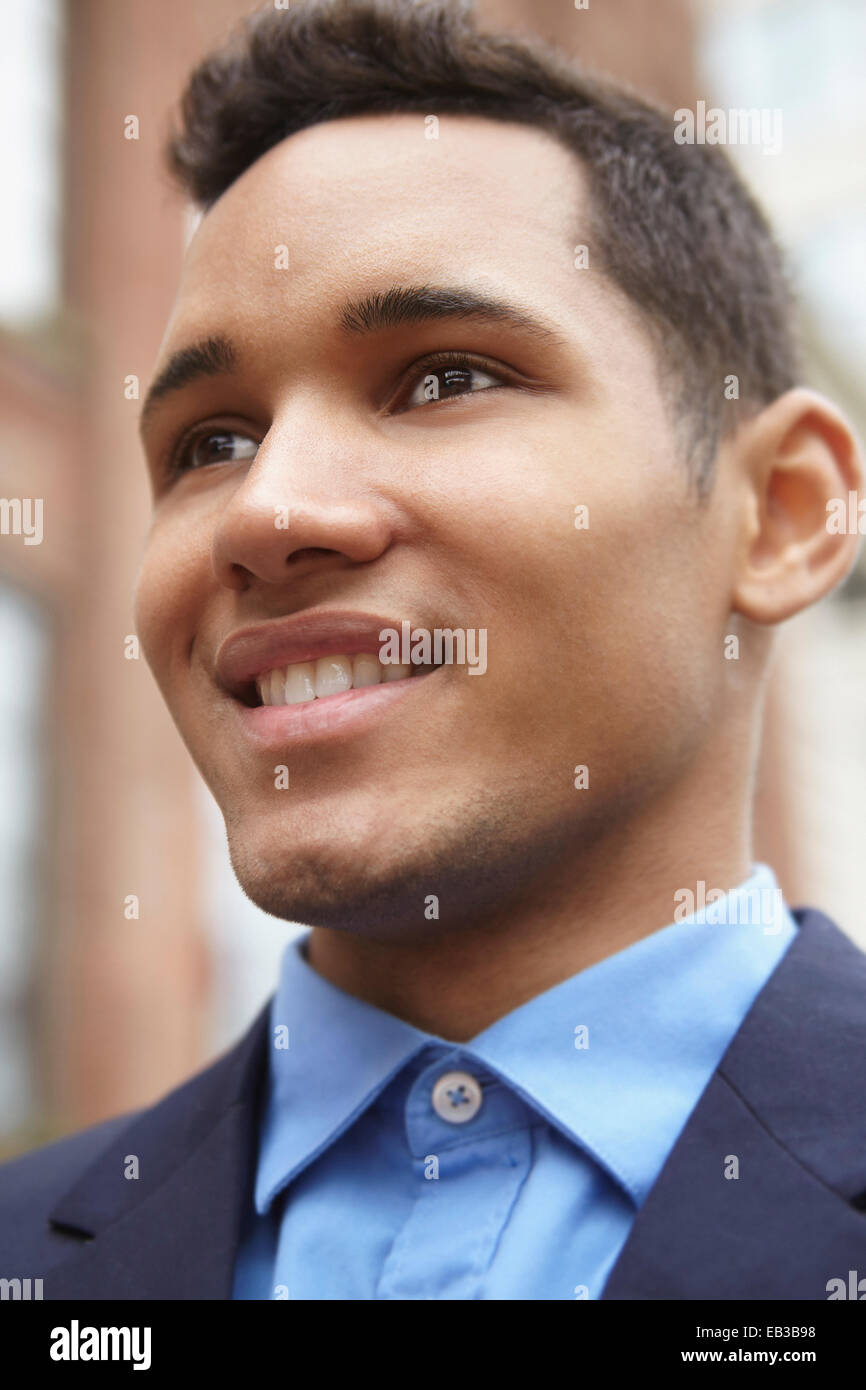 Low angle view of face of smiling man Stock Photo - Alamy