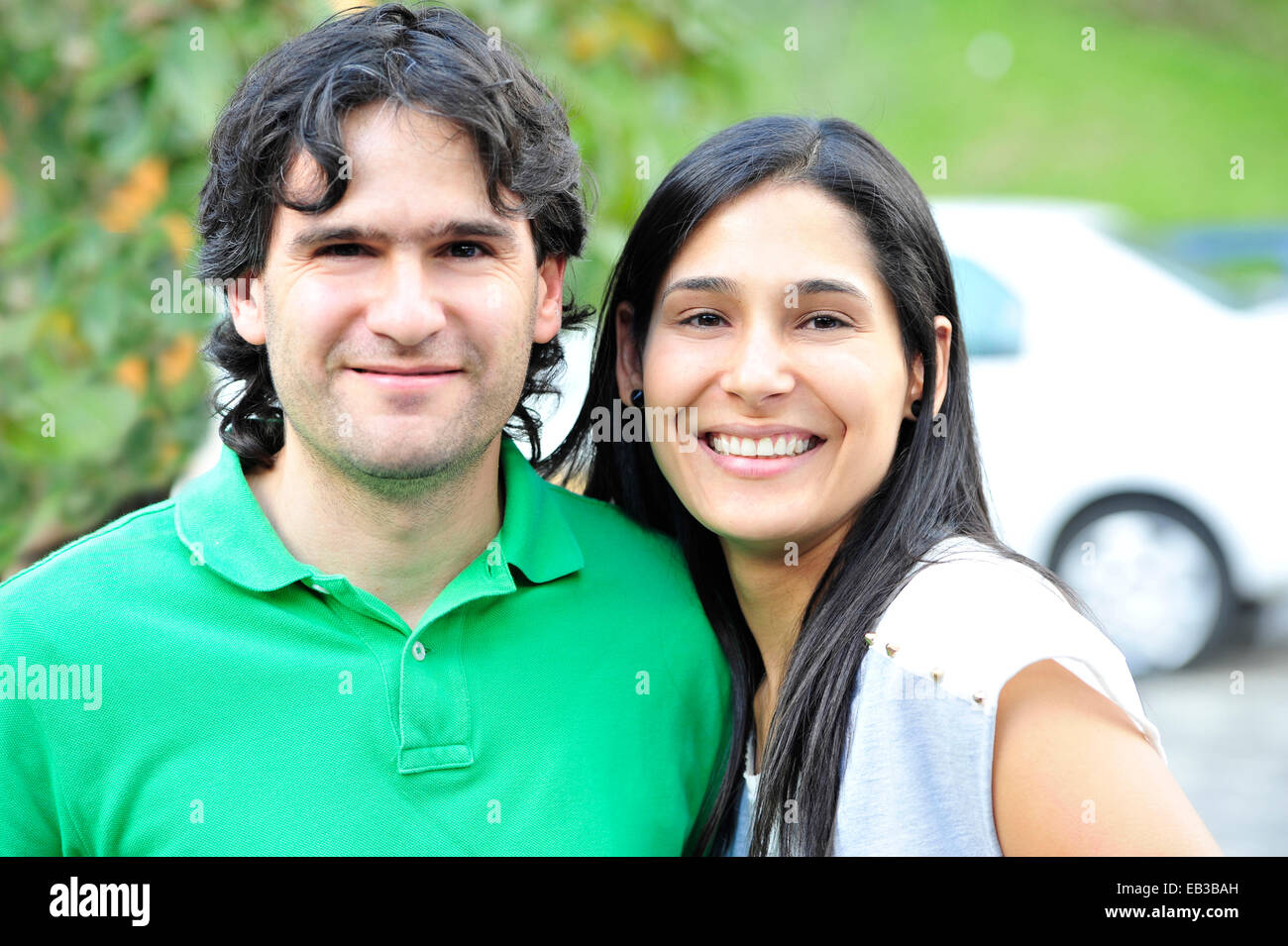 Hispanic couple smiling together Stock Photo - Alamy