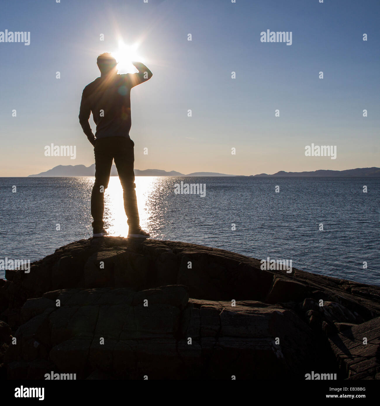 Man looking out to sea hi-res stock photography and images - Alamy