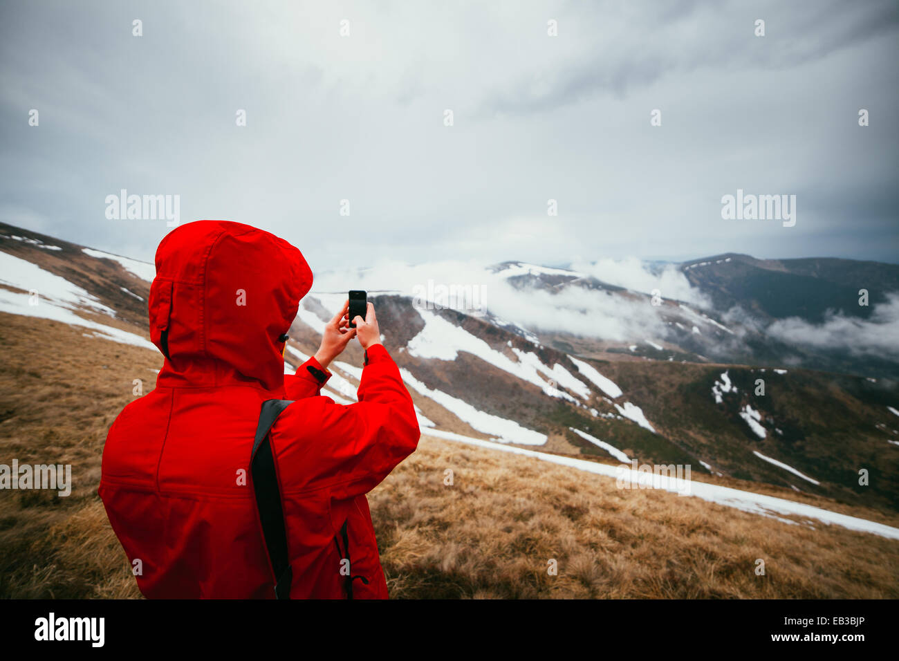 Man photographing landscape Stock Photo - Alamy