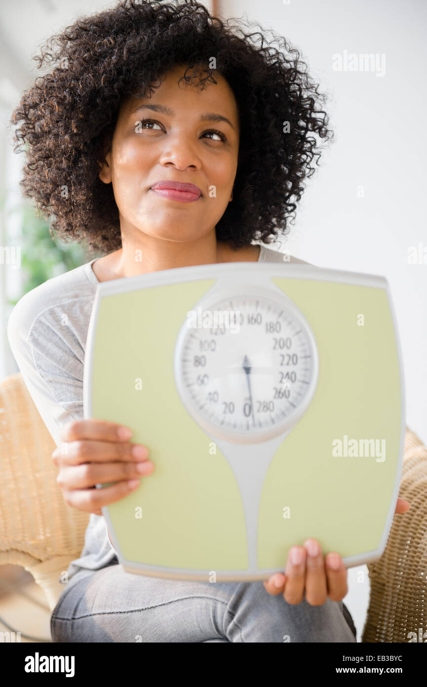 Woman Scale Happy High Resolution Stock Photography and Images - Alamy