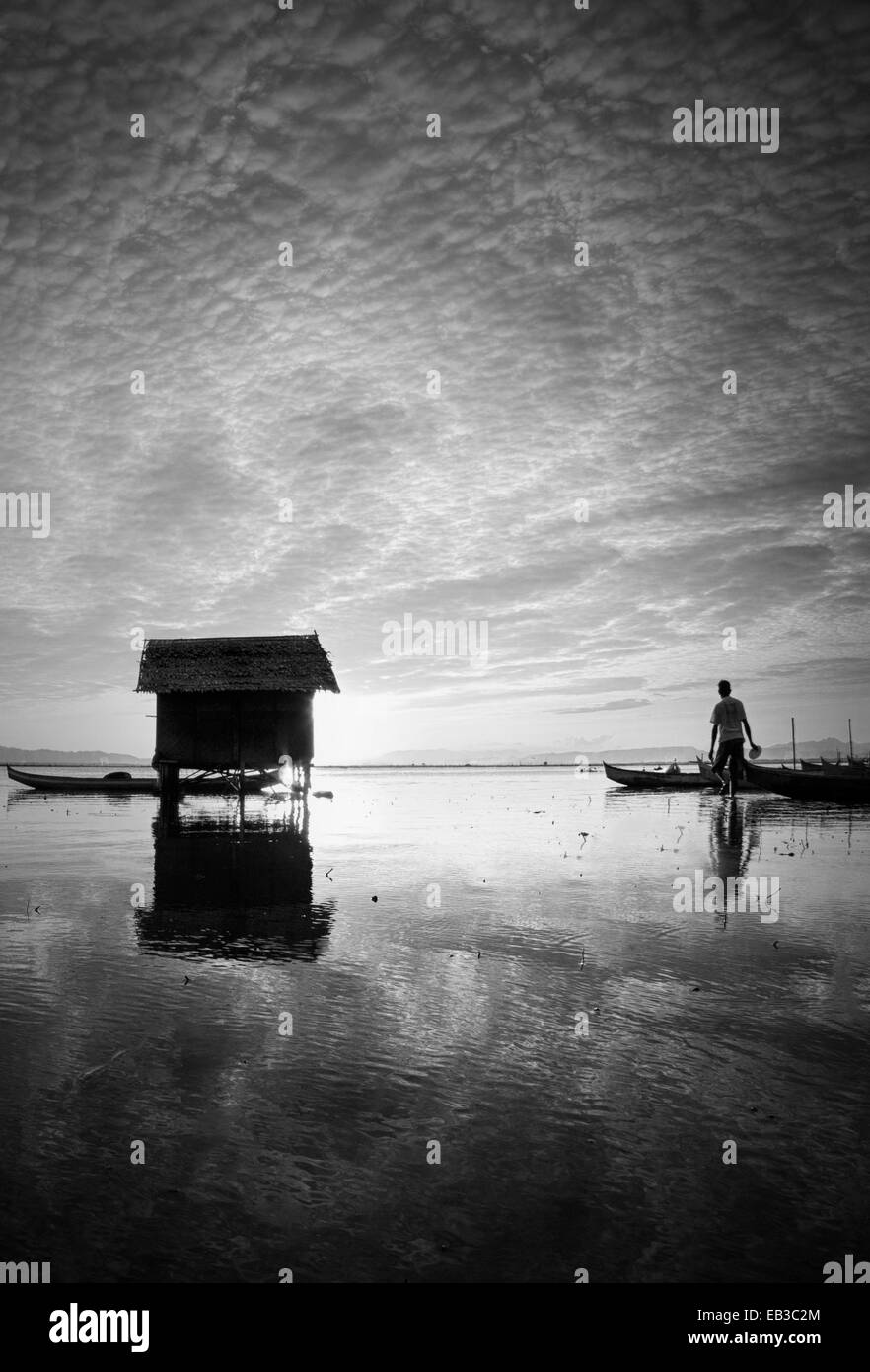 Silhouette man in fishing Black and White Stock Photos & Images - Alamy