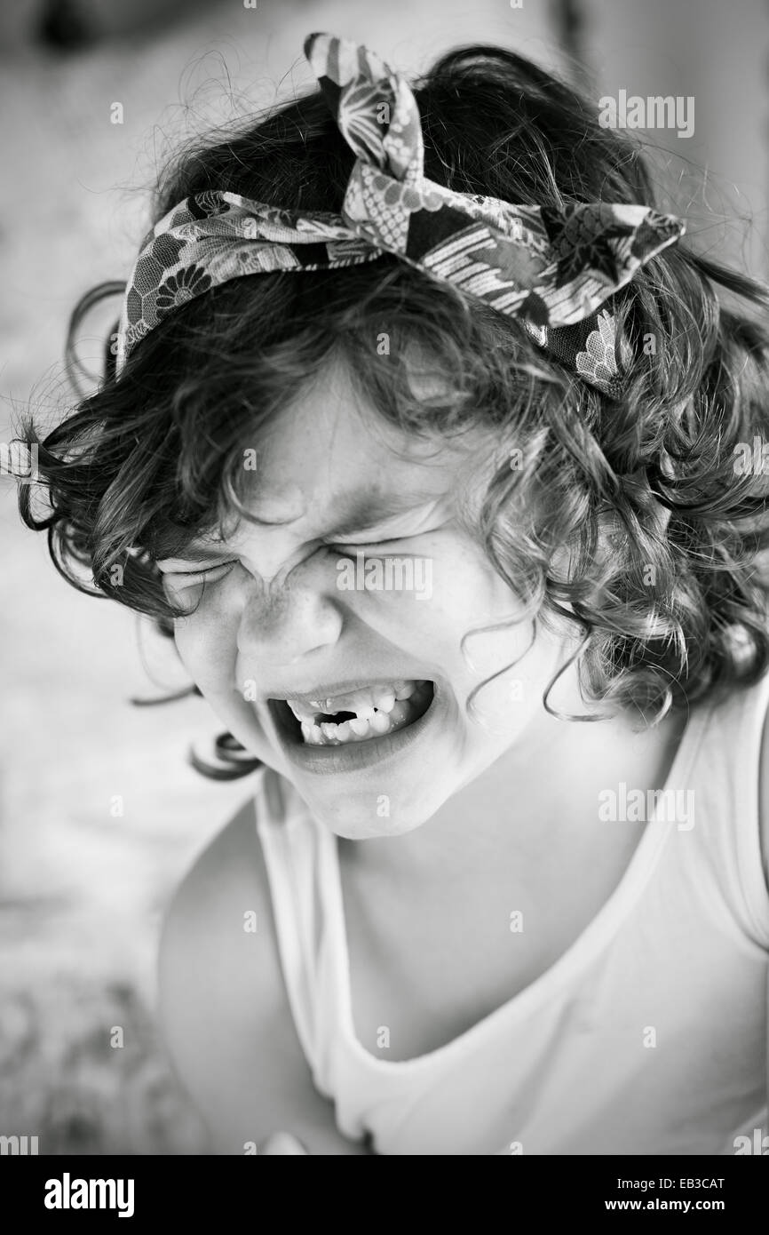 Portrait of a girl pulling funny faces Stock Photo - Alamy