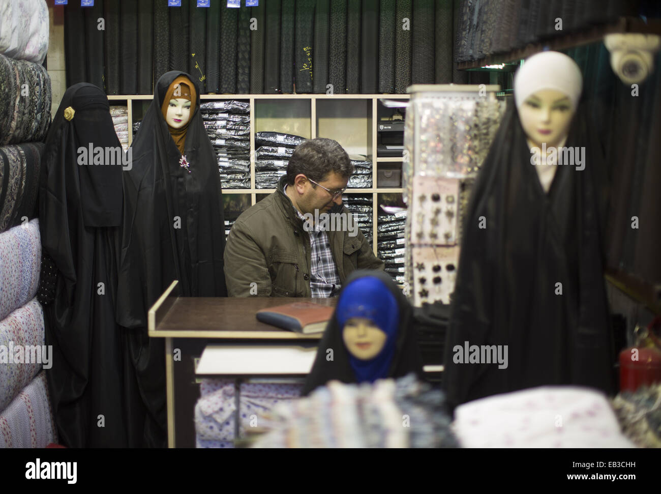 Qom, Iran. 24th Nov, 2014. November 24, 2014 - Qom, Iran - An Iranian ...