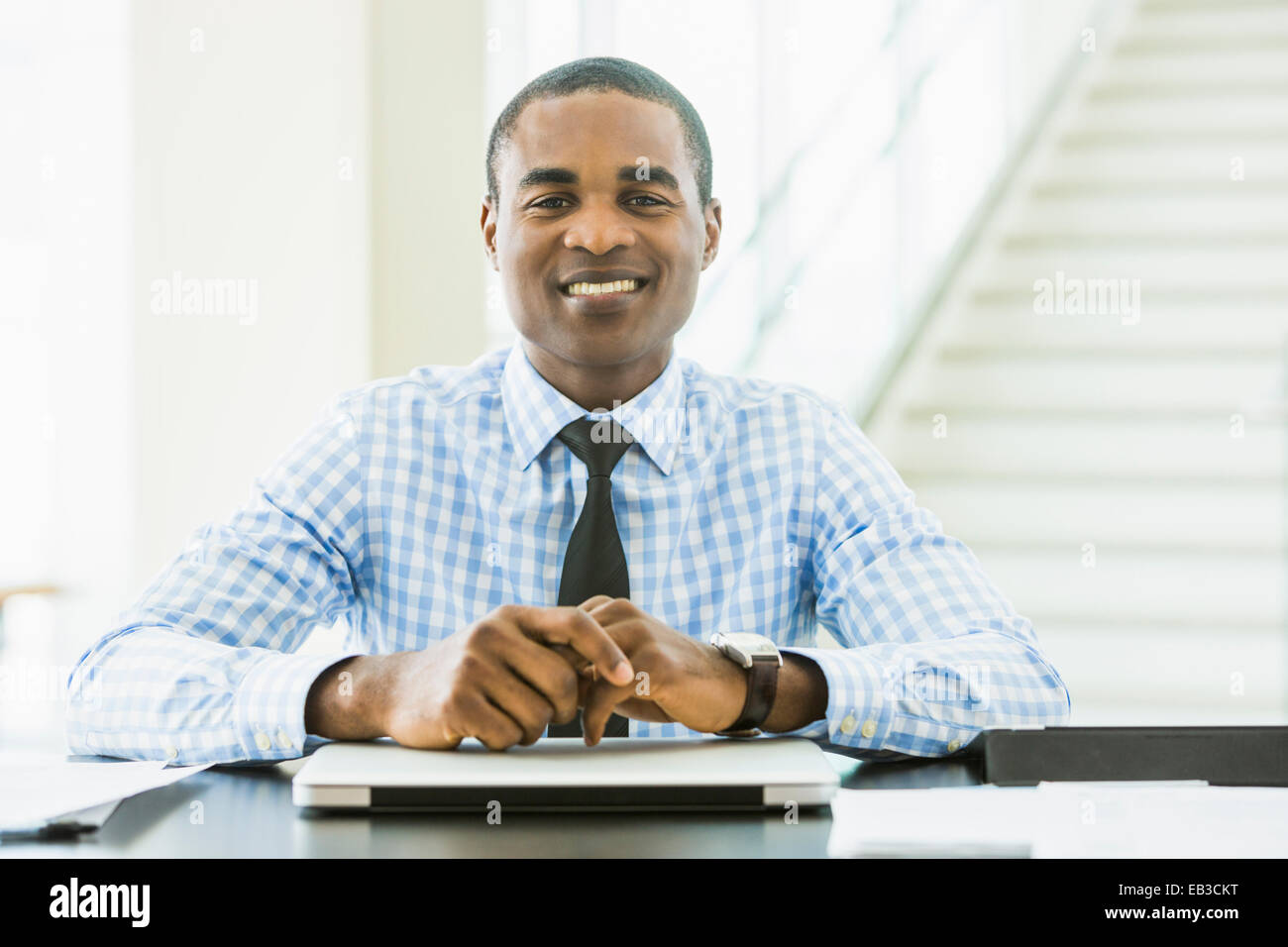 Black businessman at desk hi-res stock photography and images - Alamy