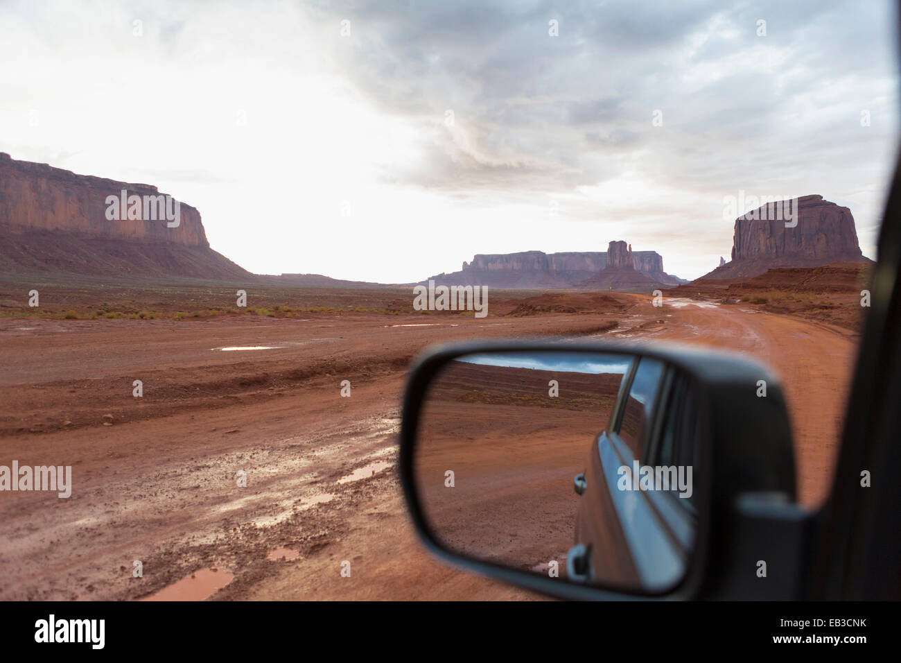 Rock formations and desert landscape viewed from car, Monument Valley ...