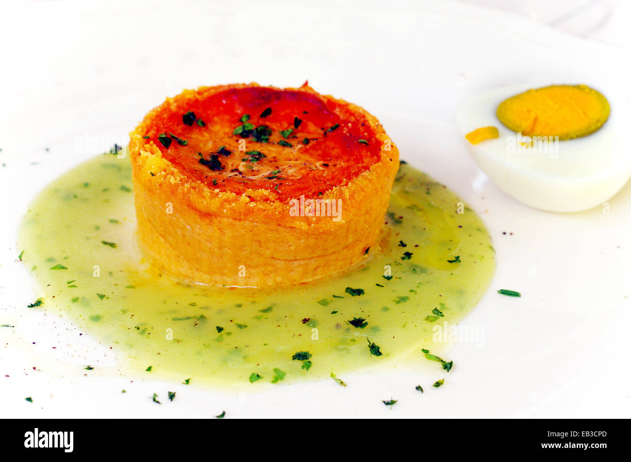 Italian pachino tomato pie with basil sauce and a hard boiled egg Stock ...