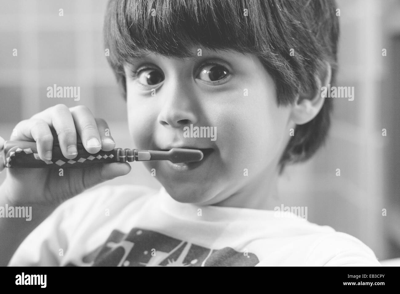 Portrait of a boy brushing his teeth Stock Photo - Alamy