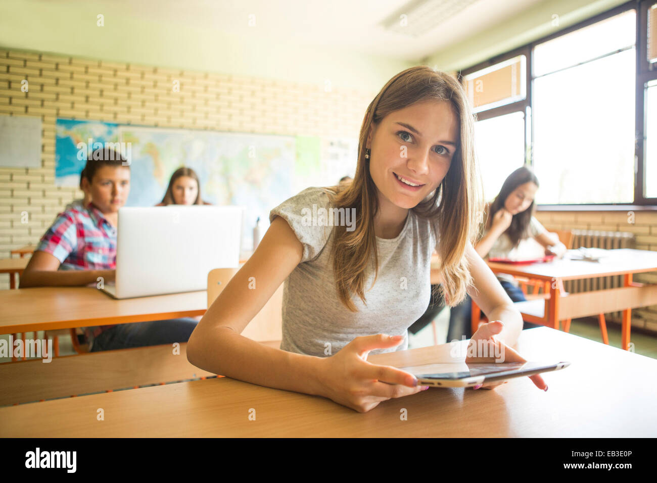 Student using digital tablet in classroom Stock Photo - Alamy Student using digital tablet in classroom Stock Photo - Alamy