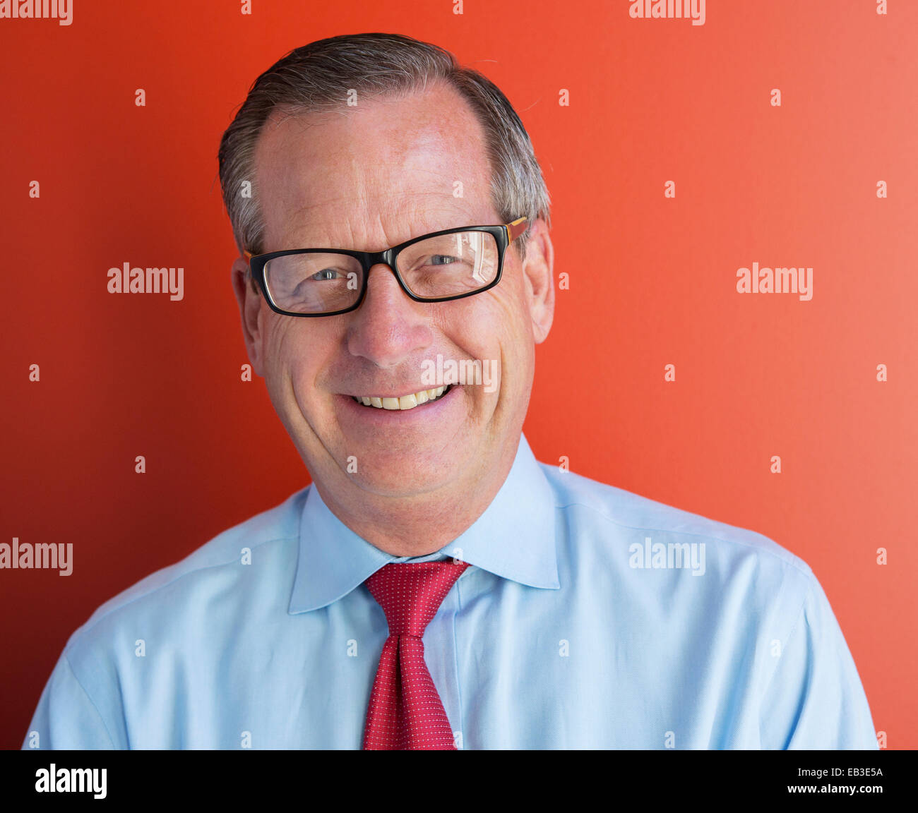 Modern businessman smiling camera close hi-res stock photography and ...