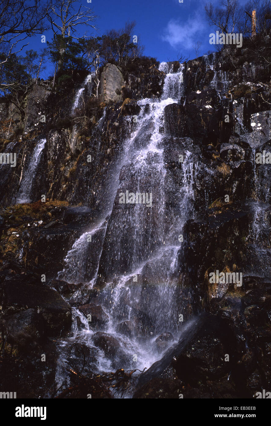 Waterfall with rainbow, nr Kinlochleven, Scotland, UK Stock Photo - Alamy