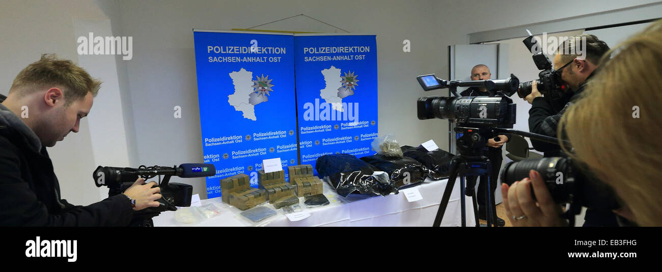 Media representatives film and photograph confiscated drugs during a ...