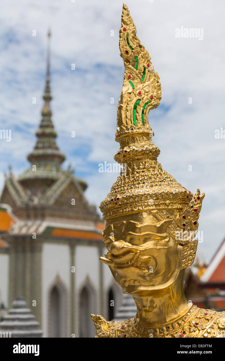 Gold statue, Wat Phra Kaew compound, Grand Palace, Bangkok Stock Photo ...