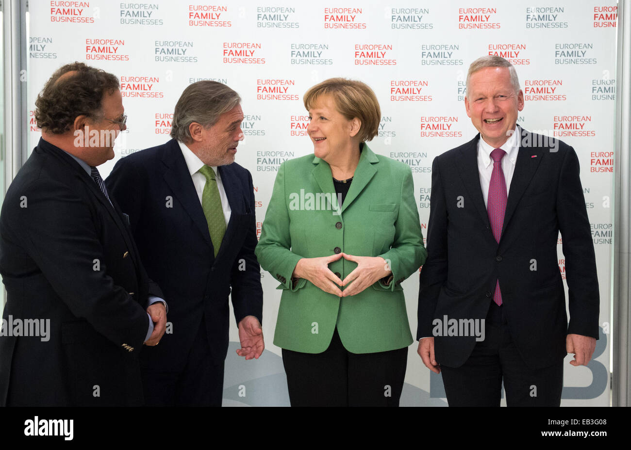 Berlin, Germany. 25th Nov, 2014. Chancellor Angela Merkel is greeted by ...