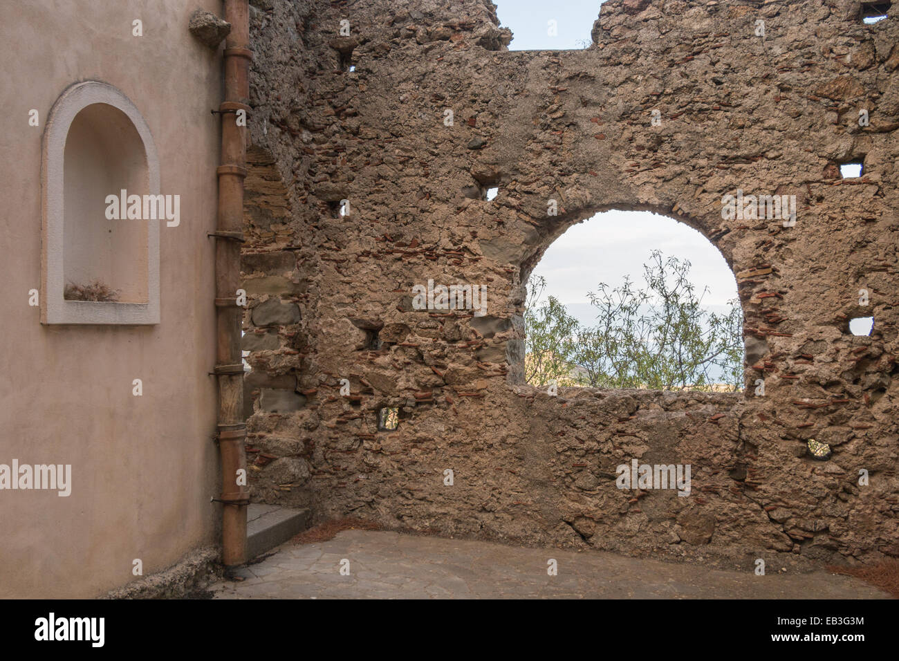 Ancient stone window that shows part of landscape Stock Photo - Alamy