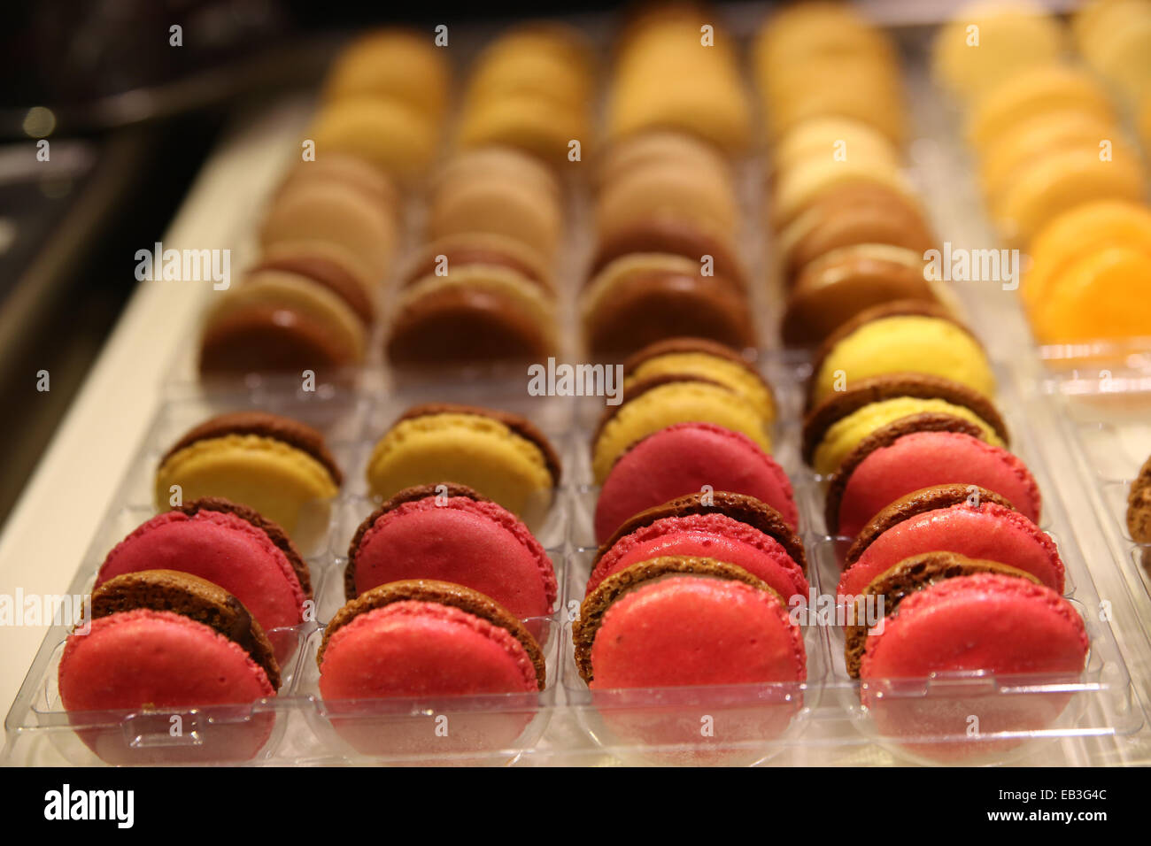pink yellow brown macaroon dessert Europe Stock Photo - Alamy
