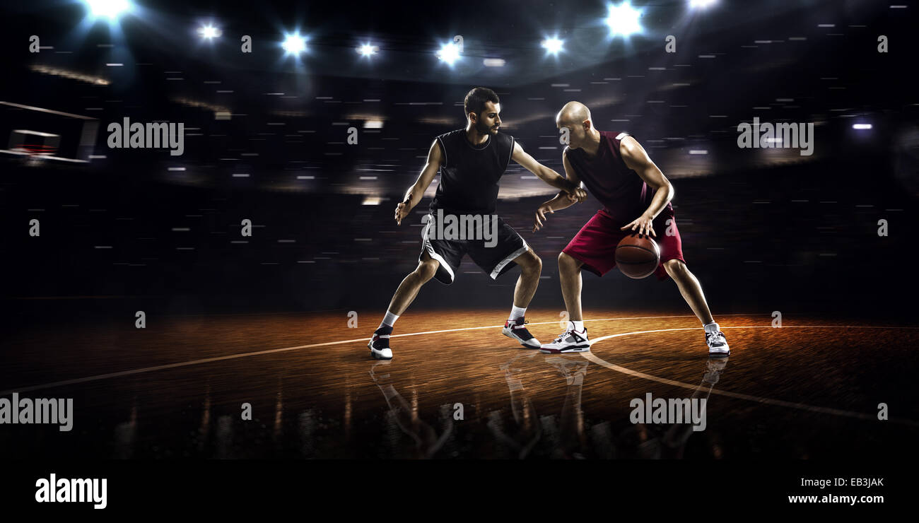 Two basketball players in action Stock Photo - Alamy