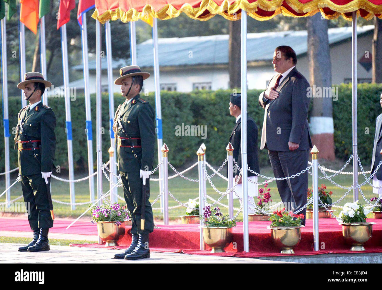 Prime Minister Muhammad Nawaz Sharif receiving salute upon his arrival ...