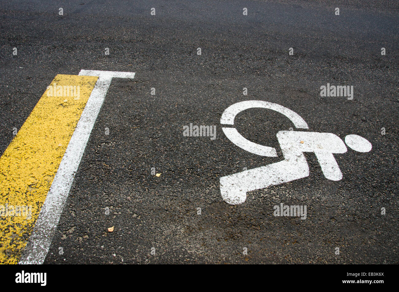 Wheelchair parking symbol on pavement High Resolution Stock Photography ...