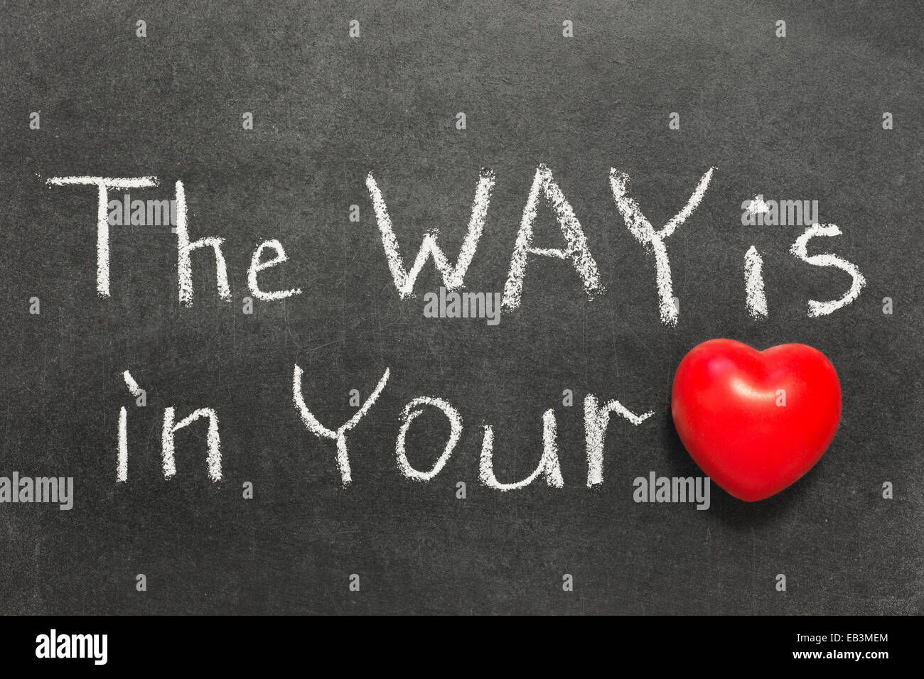 the way is in your heart phrase handwritten on blackboard with red ...