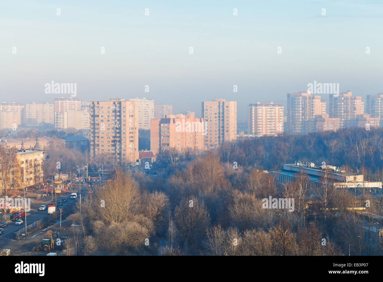 cold autumn misty sunrise above urban street Stock Photo - Alamy
