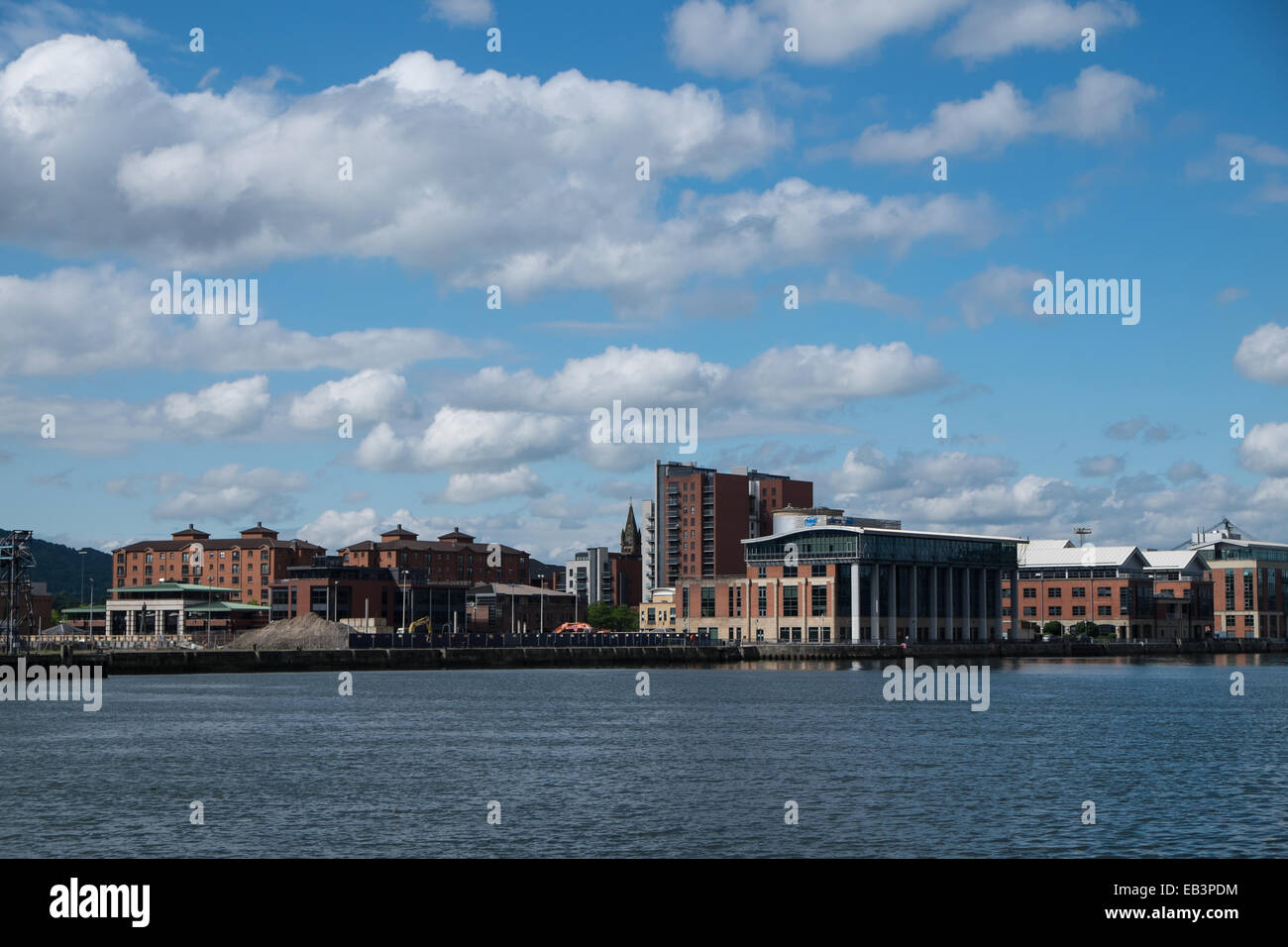 Belfast waterfront with blue sky and white clouds Stock Photo - Alamy