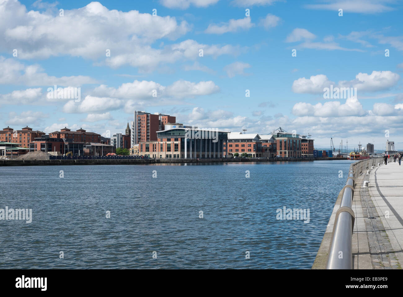 Belfast waterfront with blue sky and white clouds Stock Photo - Alamy