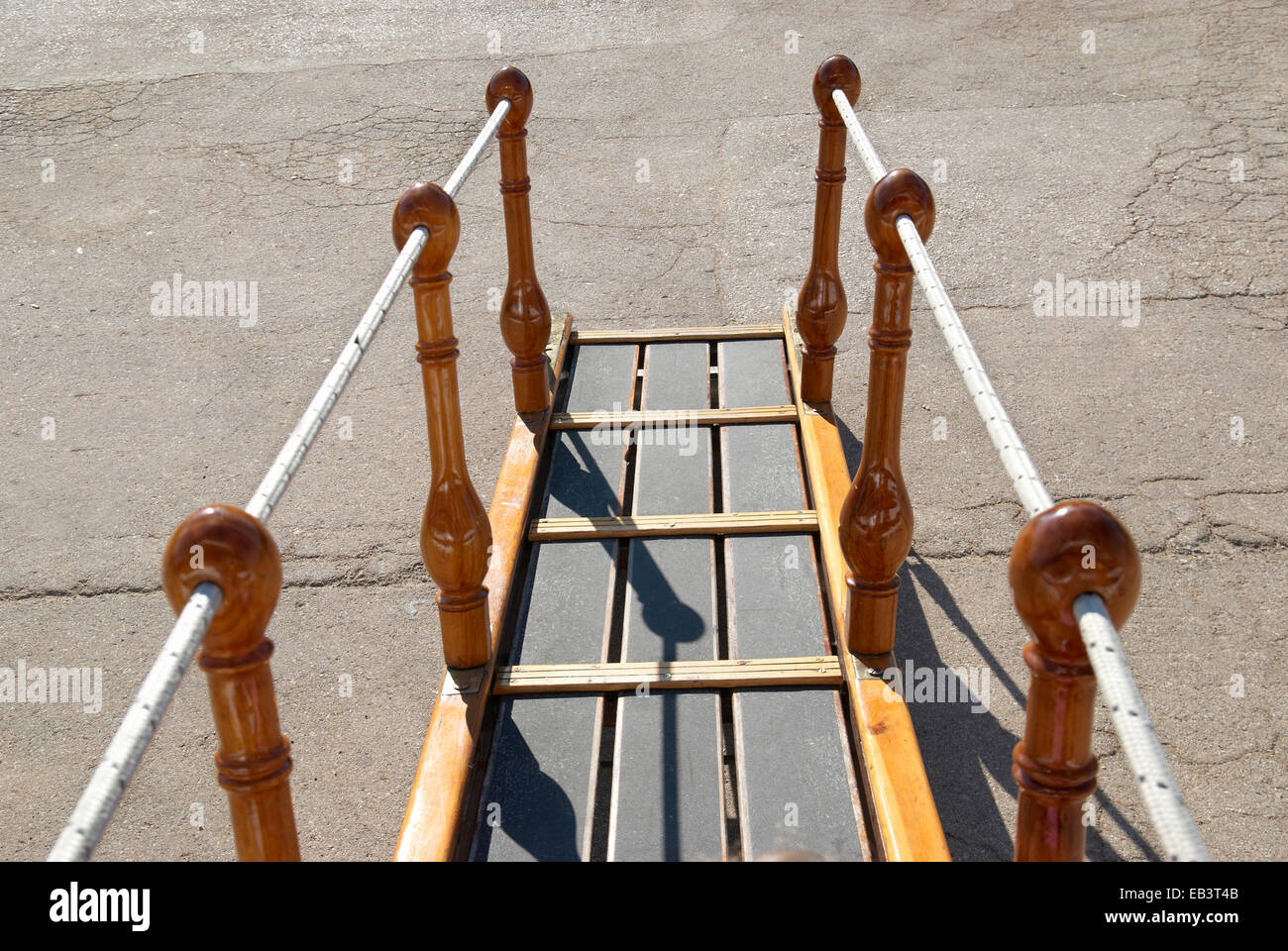 Wooden old bridge from the yacht to pier Stock Photo - Alamy