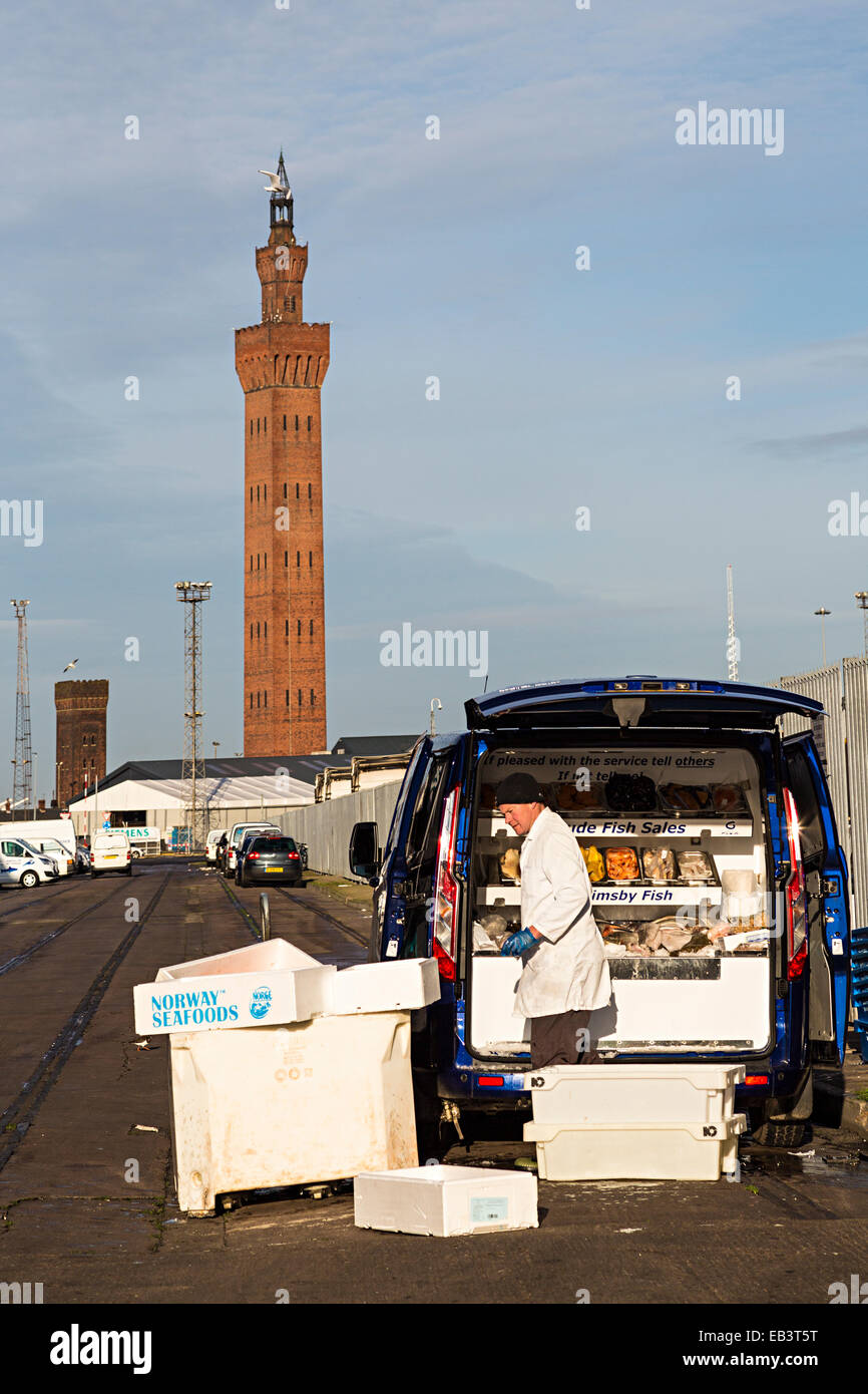 Packing fish in van with harbour dock tower, Grimsby, Lincolnshire ...