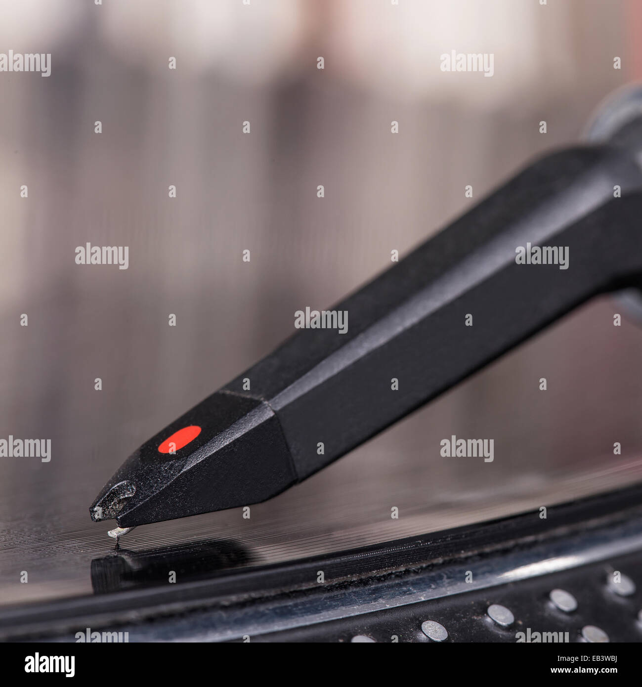 Dj needle stylus on spinning record, vinyl background Stock Photo - Alamy