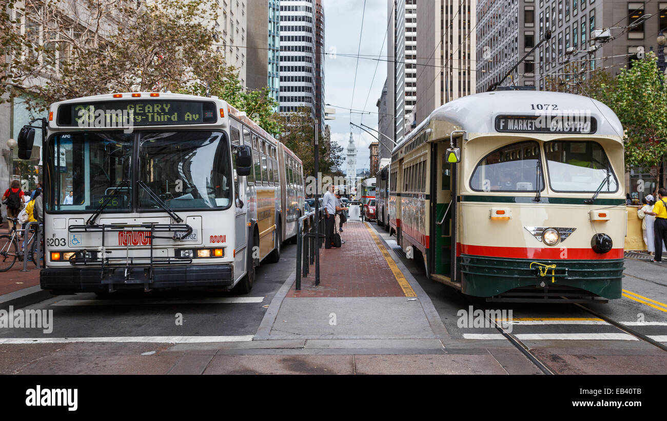 SAN FRANCISCO, CA, USA - OCTOBER 15, 2014: Bus and tram wait at an ...