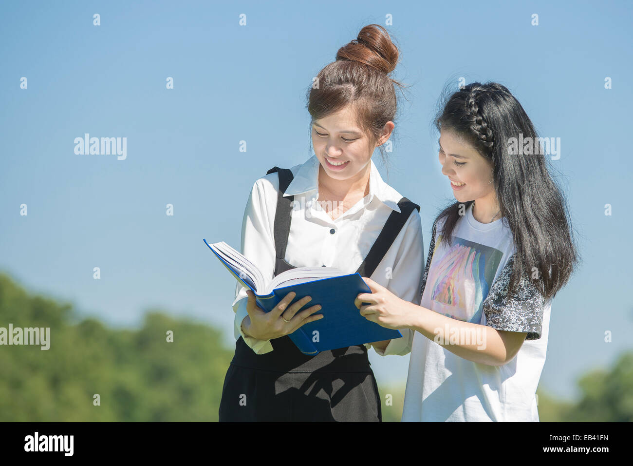 Young student reading school hi-res stock photography and images - Alamy