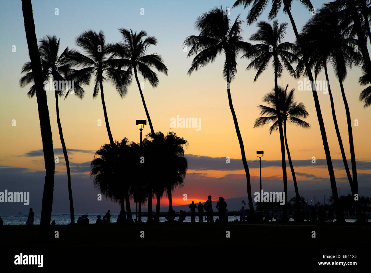 People watching sunset, Fort DeRussy Beach Park, Waikiki, Honolulu ...