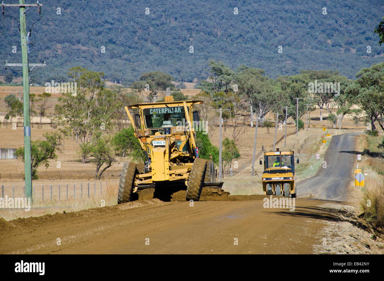 Caterpillar grader grading road hi-res stock photography and images - Alamy