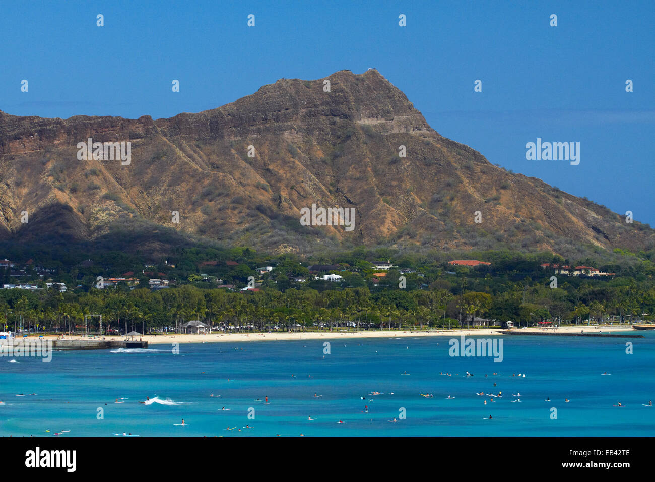 Diamond Head (old volcanic crater) and surfers, Waikiki, Honolulu, Oahu ...