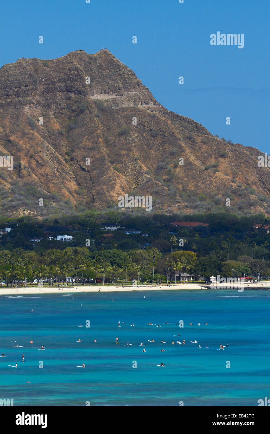 Diamond Head (old volcanic crater) and surfers, Waikiki, Honolulu, Oahu ...
