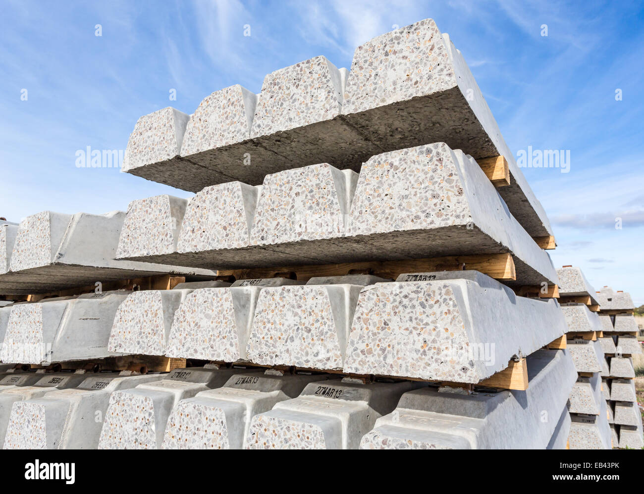 Concrete railway sleepers stacked awaiting railway line maintenance ...
