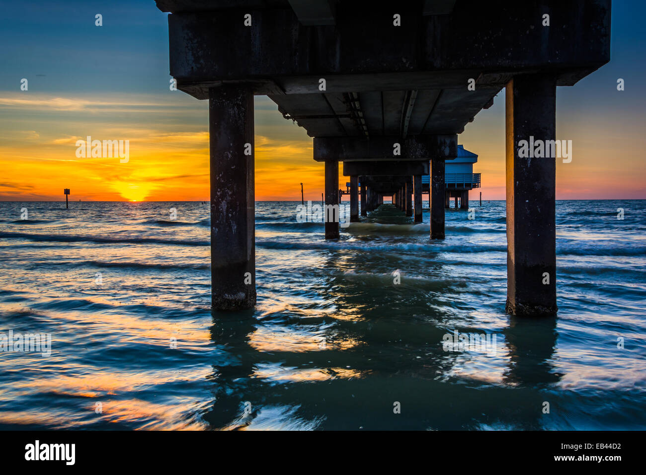 Fishing pier in the Gulf of Mexico at sunset, Clearwater Beach, Florida ...