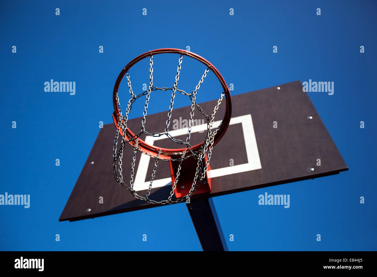 Basketball hoop on a blue sky background Stock Photo - Alamy