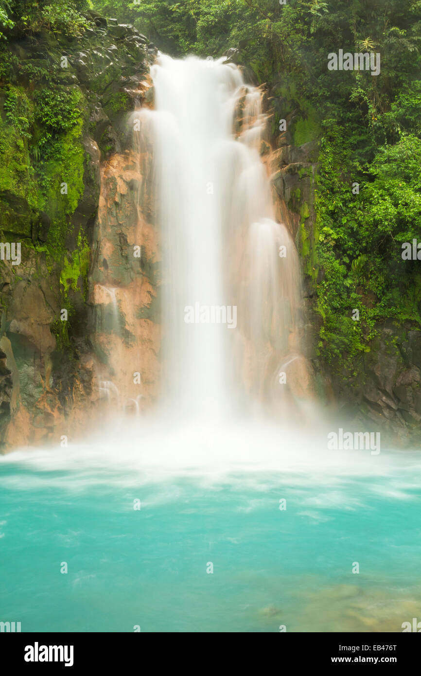 The cerulean blue waters of the Rio Celeste Waterfall in Volcan Tenorio ...
