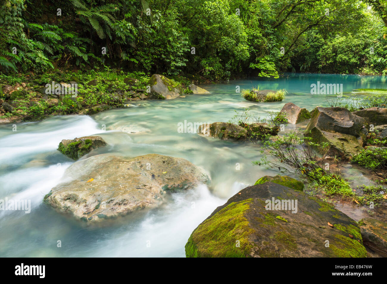 The cerulean blue waters of the 'Blue Lagoon' on the Rio Celeste in ...